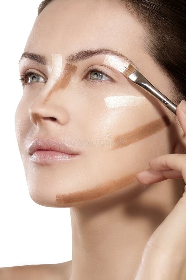 Beautiful Model Applying Cosmetic Cream Treatmen on Her Face Stock ...