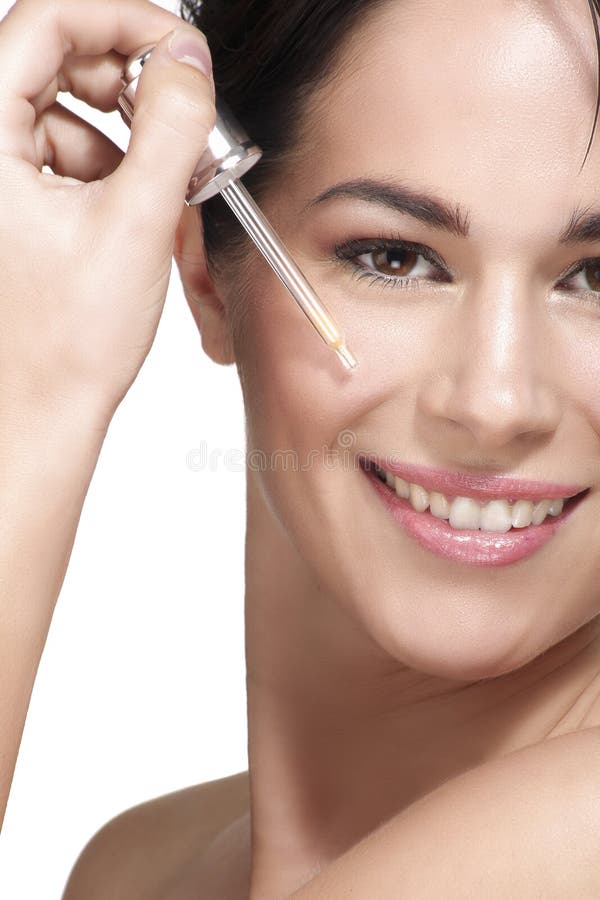 Beautiful Model Applying a Skin Serum Treatment Stock Image - Image of ...