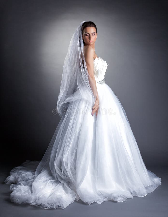 Beautiful Model Posing in Lush Wedding Dress Stock Photo - Image of ...