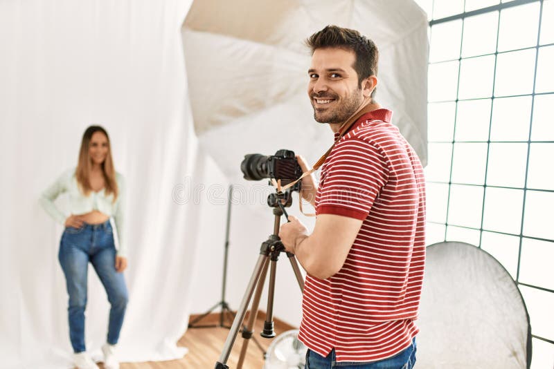 Beautiful Model Posing for Professional Photographer Man at Photography ...