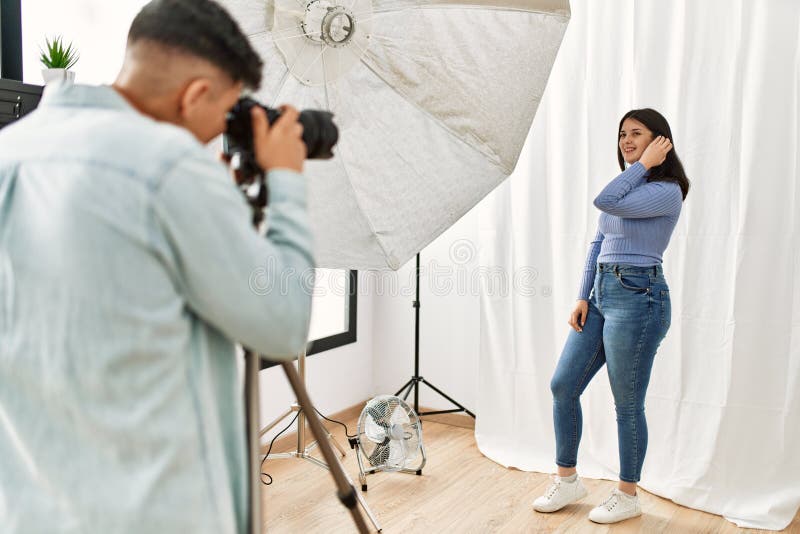 Beautiful Model Posing for Professional Photographer Man at Photography ...