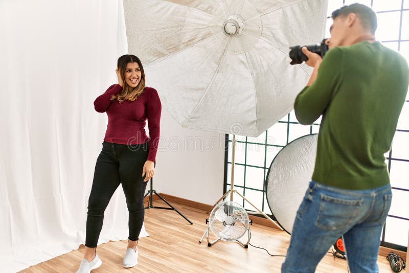 Beautiful Model Posing for Professional Photographer at Studio Stock ...
