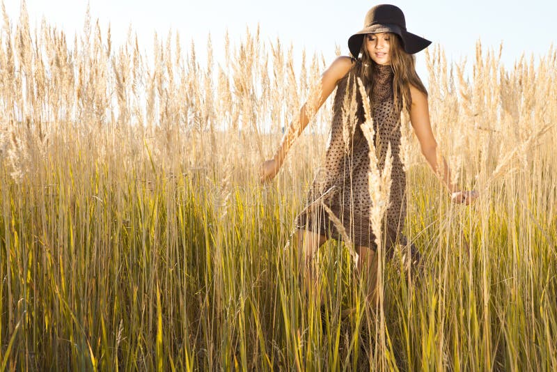 Beautiful Model Wandering through Meadow Wilds at Midday Stock Image ...