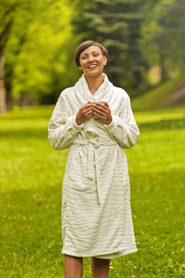 A Beautiful Model Wearing a White Toweling Robe Standing Stock Photo ...