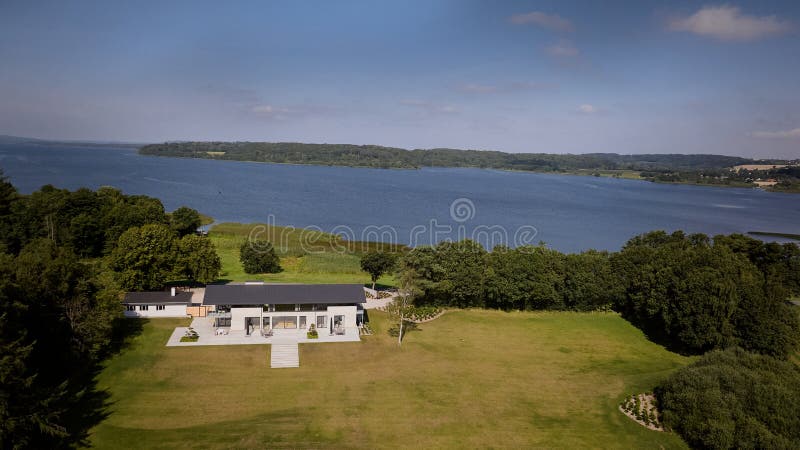 Beautiful Modern Beach House by the Water Stock Photo - Image of ...