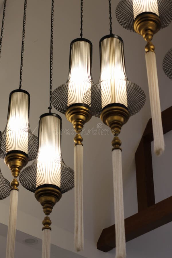 A Modern Lighting Lamp Hanging on Ceiling Stock Photo - Image of ...