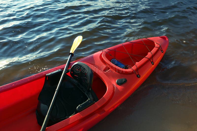 Beautiful Modern Red Kayak with Paddle on Beach Stock Image - Image of ...