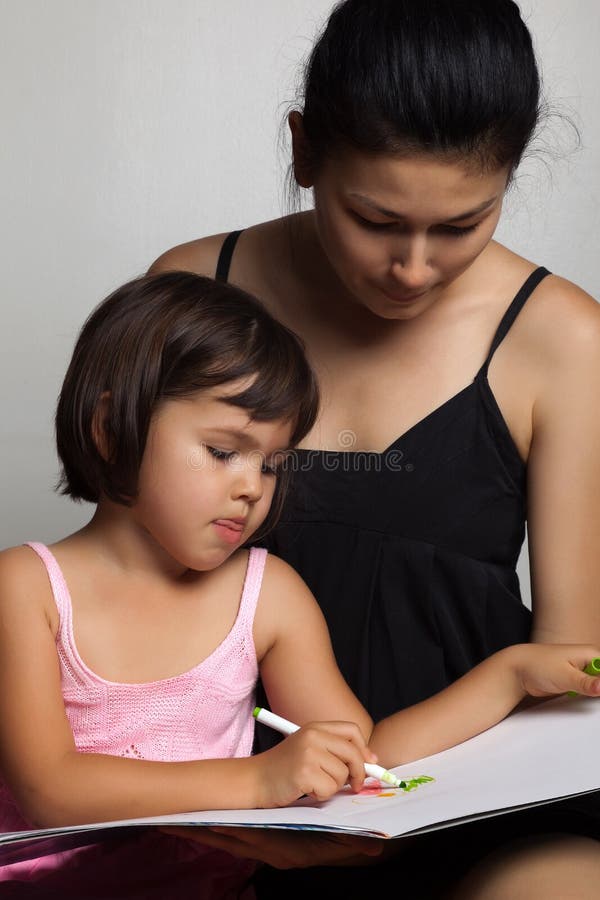Beautiful Mom Helping Her Daughter Drawing Stock Photo - Image of cute ...