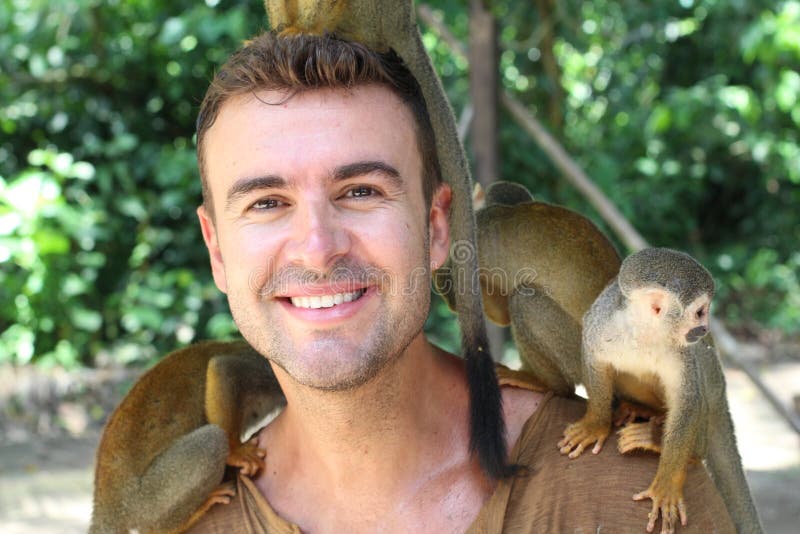 Beautiful Monkeys Interacting with a Human Stock Image - Image of ...