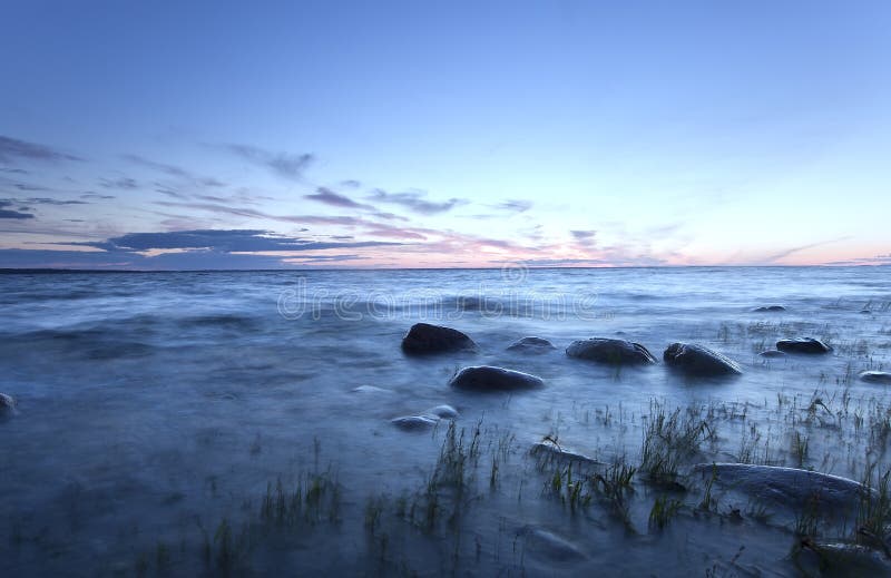 Beautiful moody sunset stock image. Image of summer, rock - 22655103