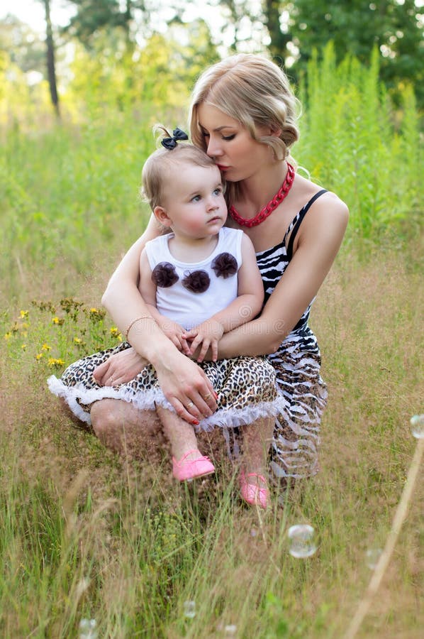Beautiful Mother and Her Daughter Outdoors Stock Photo - Image of baby ...