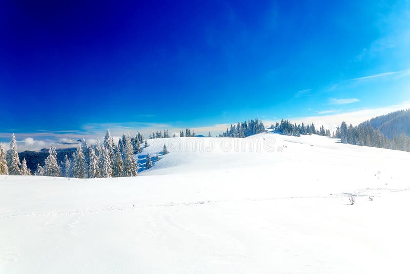 Beautiful Mountain Landscape and Snowy Paths in the Snow with Tourists ...