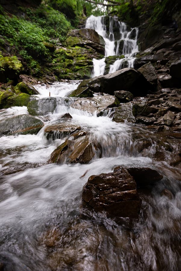 Beautiful Mountain Rainforest Waterfall with Fast Flowing Water and ...