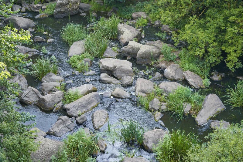 A Beautiful Mountain Stream Flows among Stones and Rocks Stock Image ...
