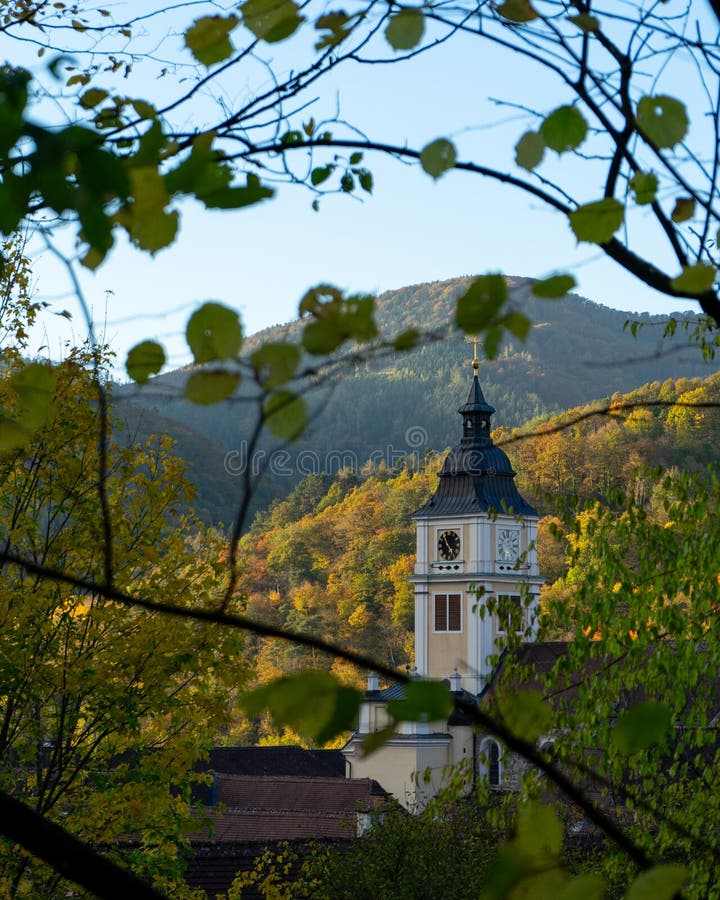 A Beautiful Mountain View with a Clock Tower in the Distance Stock ...