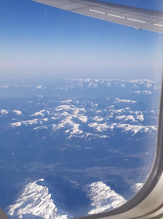 Beautiful Mountain View from Inside the Plane Stock Image - Image of ...