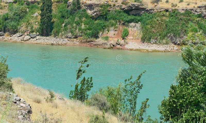 A Beautiful Mountainous Landscape with an Emerald-colored River. Stock ...