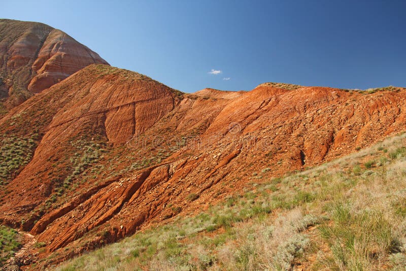 Beautiful Mountains of Red Clay Against the Blue Sky. Landscape Stock ...