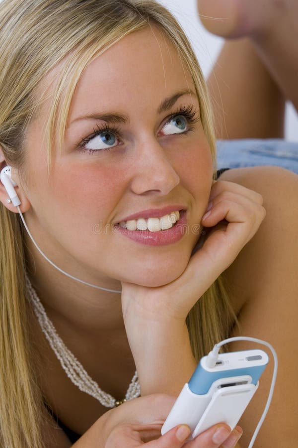 Beautiful MP3 stock photo. Image of face, portable, blue - 2391736