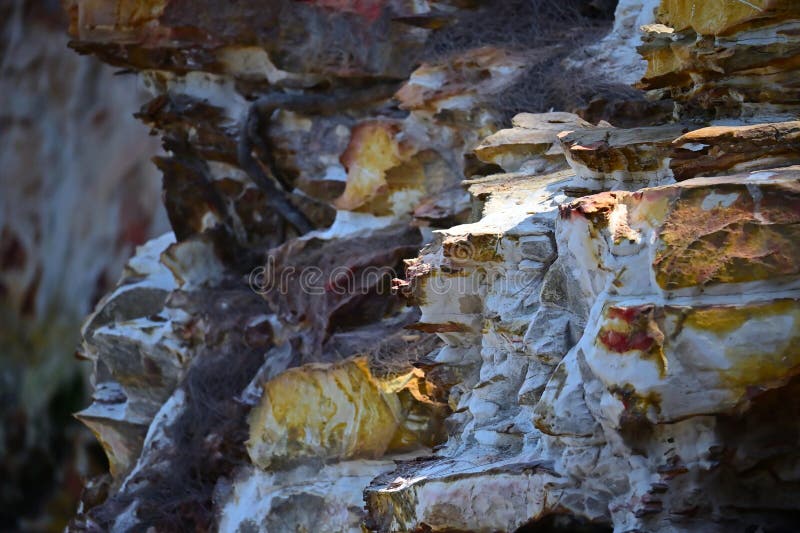 Beautiful Multi-Colored Beach Cliff with Interesting Red Stone Stock ...