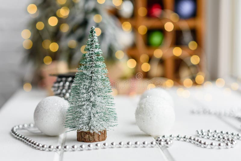 Beautiful Multi-colored Christmas Decorations on a Light Wooden Table ...