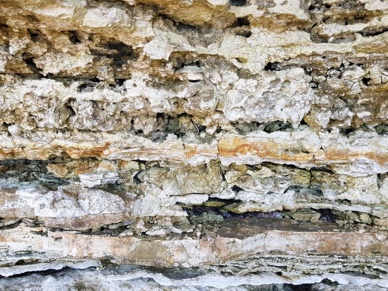 Beautiful Multi-colored Rock Pattern. Wavy Asymmetrical Layers of ...