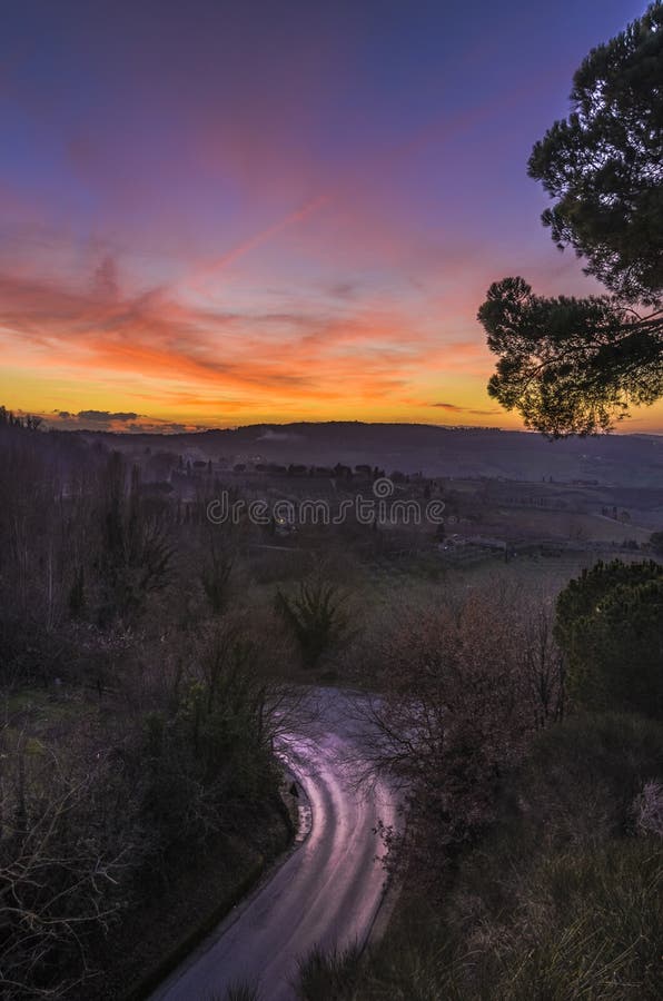Beautiful Multicolor Sunset Over Country Road Stock Photo - Image of ...
