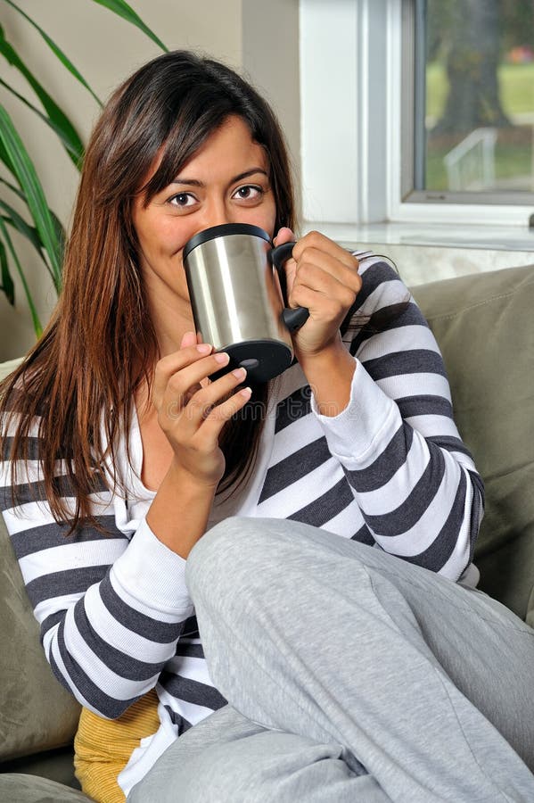 Beautiful Multiracial Model Drinking Stock Image - Image of couch ...