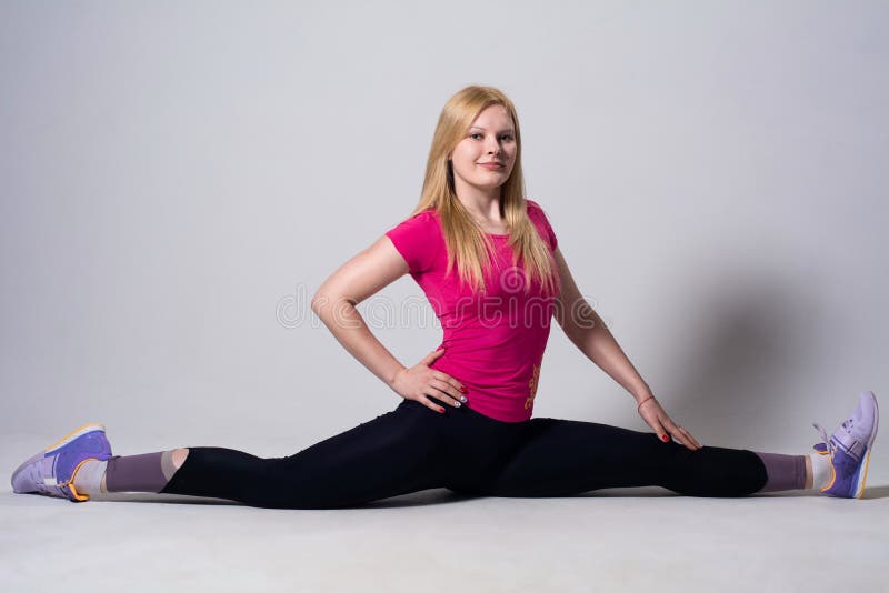 Beautiful Muscular Woman Doing Front Split Stock Photos - Free ...