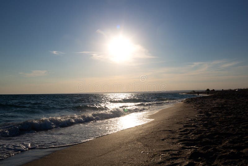 Beautiful Natural Sandy Beach with Waves at Sunset Stock Image - Image ...