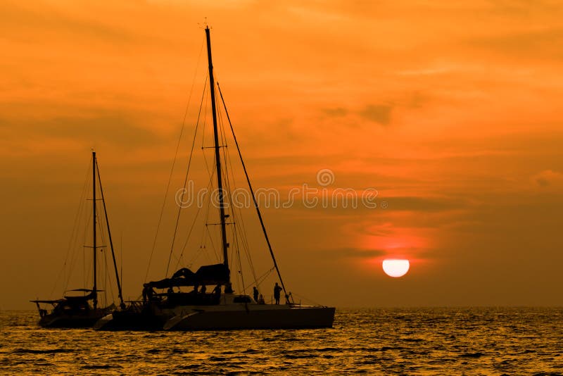Beautiful Natural Scenic of Sun Set Behind Sailing Boat Stock Photo ...