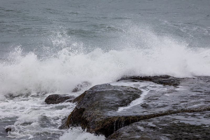 Beautiful Nature Scene of Sea Wave Hitting on the Black Stone Shoreline ...