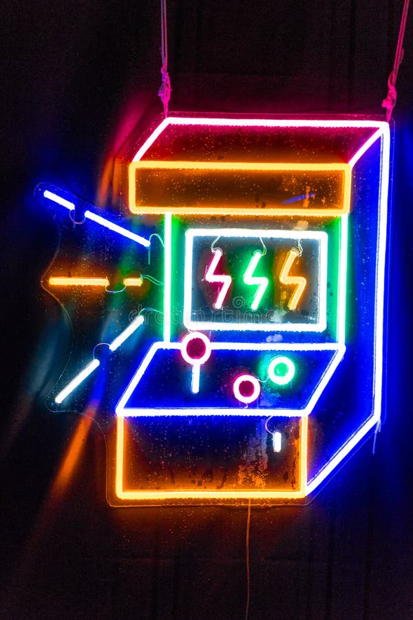Neon Lights of Arcade Machine Stock Image - Image of arcade, machine ...