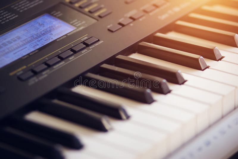 Beautiful New Synthesizer Illuminated by the Orange Rays Stock Photo ...
