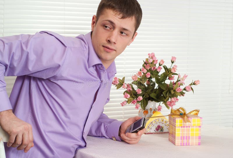Beautiful Nice Caucasian Male Sitting at a Table Stock Photo - Image of ...