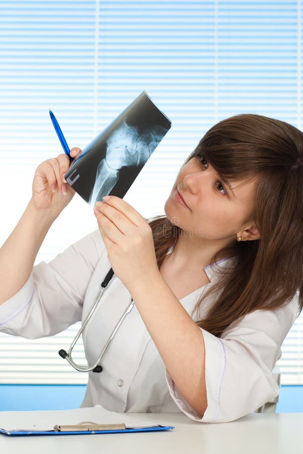 Beautiful Nice Caucasian Nurse Sitting at a Table Stock Photo - Image ...