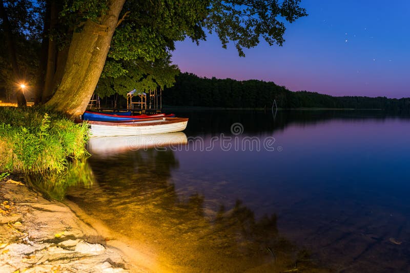 Beautiful Night Lake Landscape. Small Boat on Night Lake Stock Image ...
