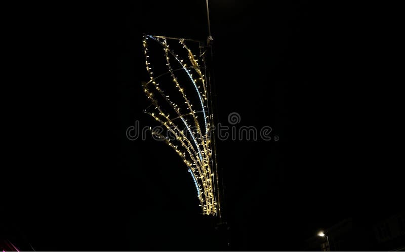 Beautiful Night Light Bulb Decor in the Shape of Wing on a Lamp Post ...