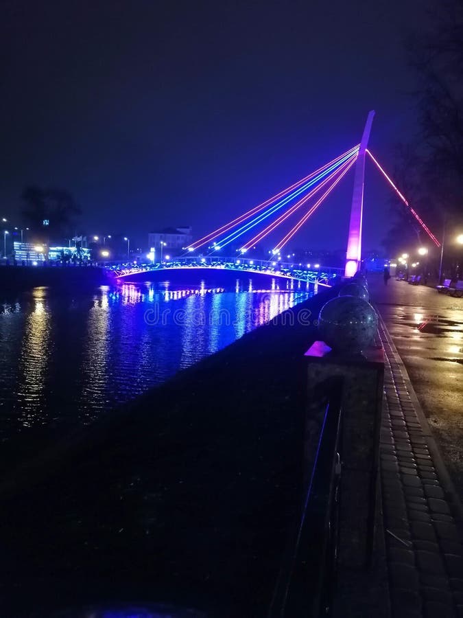 Night Promenade in the Distance by the River with Illuminated Houses ...