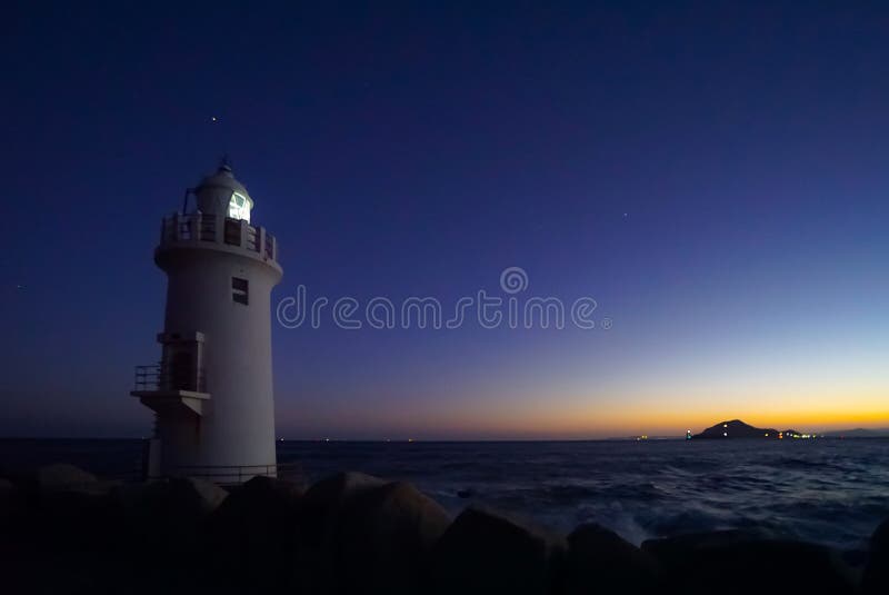 A Beautiful Night Sky Behind a White Lighthouse Stock Image - Image of ...