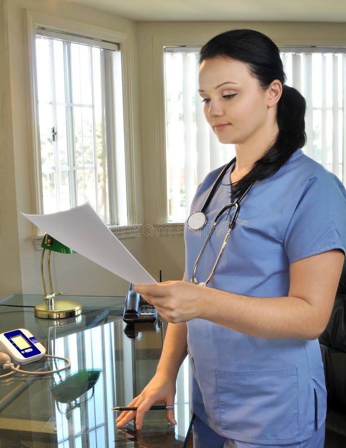 Beautiful nurse working stock photo. Image of looking - 6663892