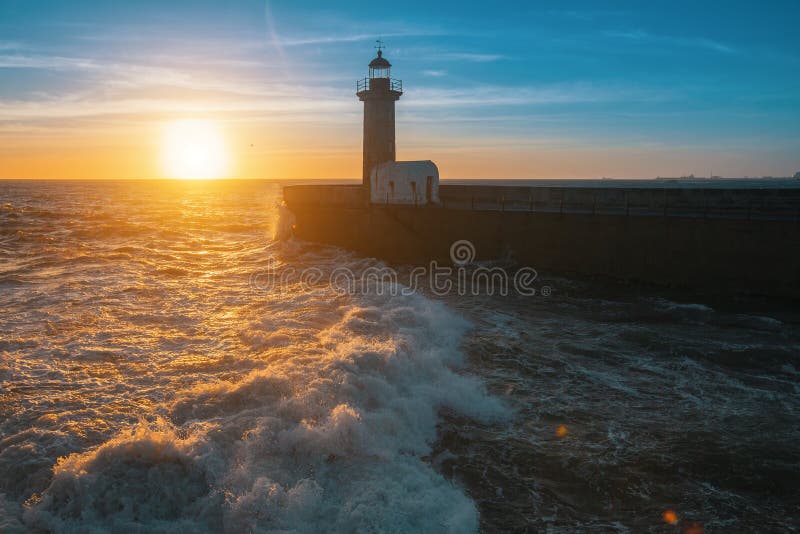 Beautiful Ocean Sunset and Surf at the Lighthouse. Nature. Stock Photo ...