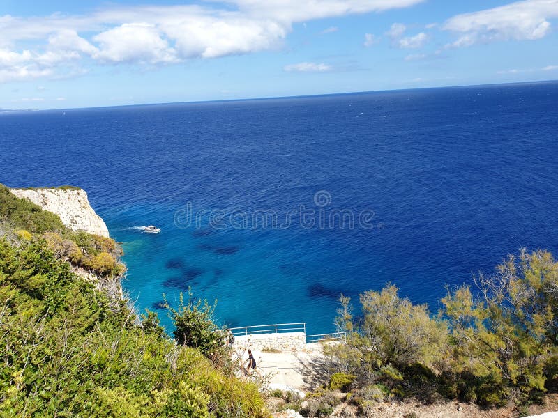 Beautiful Ocean View with Boat and Cliff Stock Photo - Image of boat ...