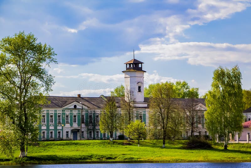 Beautiful Old Manor on a Background of Green Trees in Spring Stock ...
