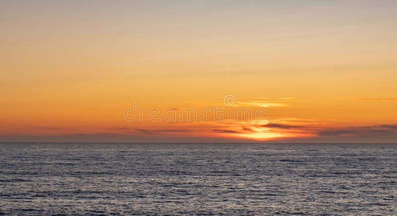 Beautiful Orange Sky At Dusk On The Ocean Just After Sunset Stock Image ...