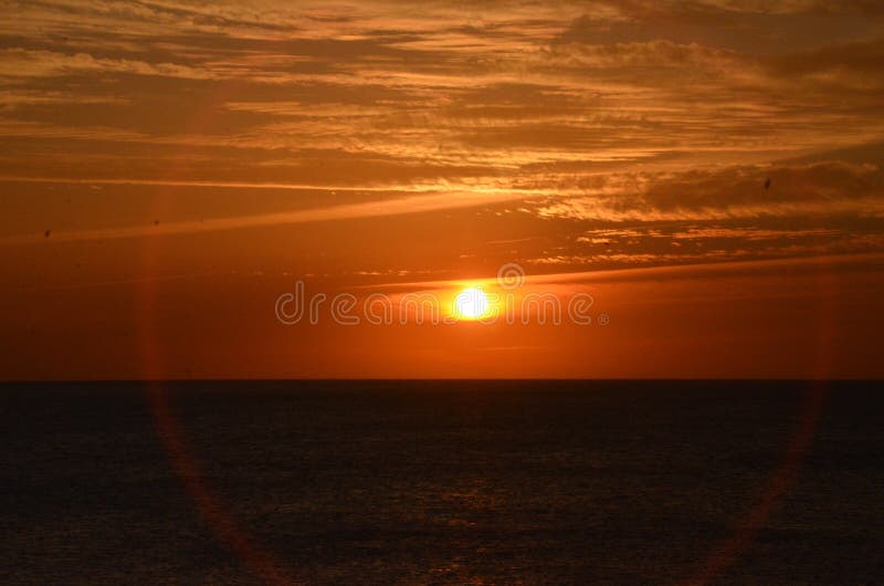 Beautiful Orange Sunset Over the Sea on the Tropical Beach Stock Image ...