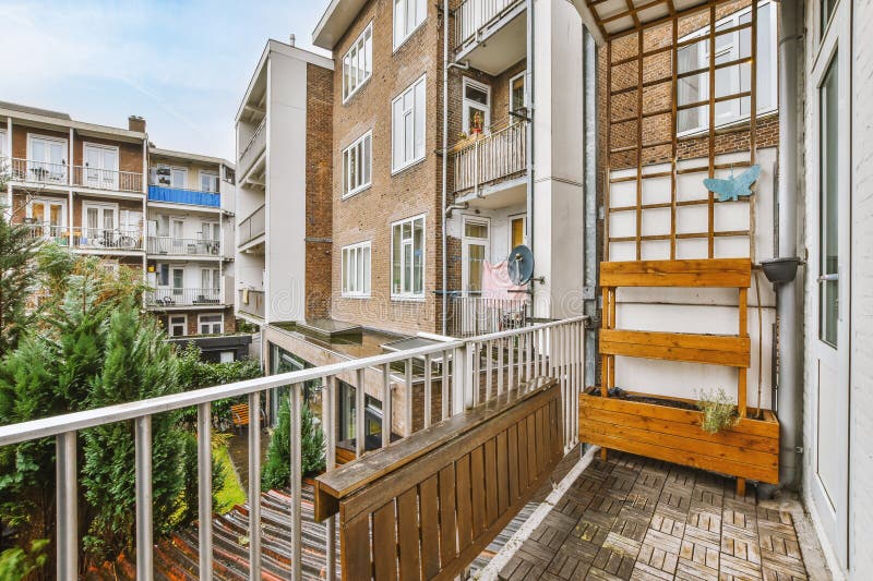 An Outside View of a Home in the Sunset with Palm Trees Stock Image ...