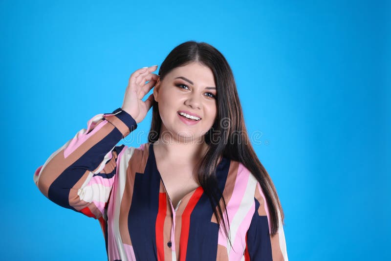Beautiful Overweight Woman Posing on Blue Background. Plus Size Model ...