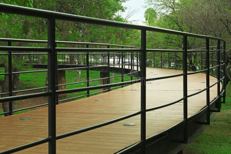 Beautiful Pathway with Metal Handrails in Park Near Trees Stock Image ...