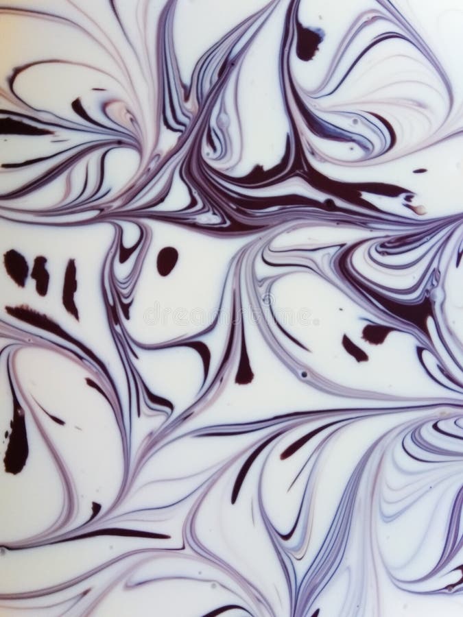 Beautiful Patterns when Mixing Paints of Different Colors Stock Photo ...